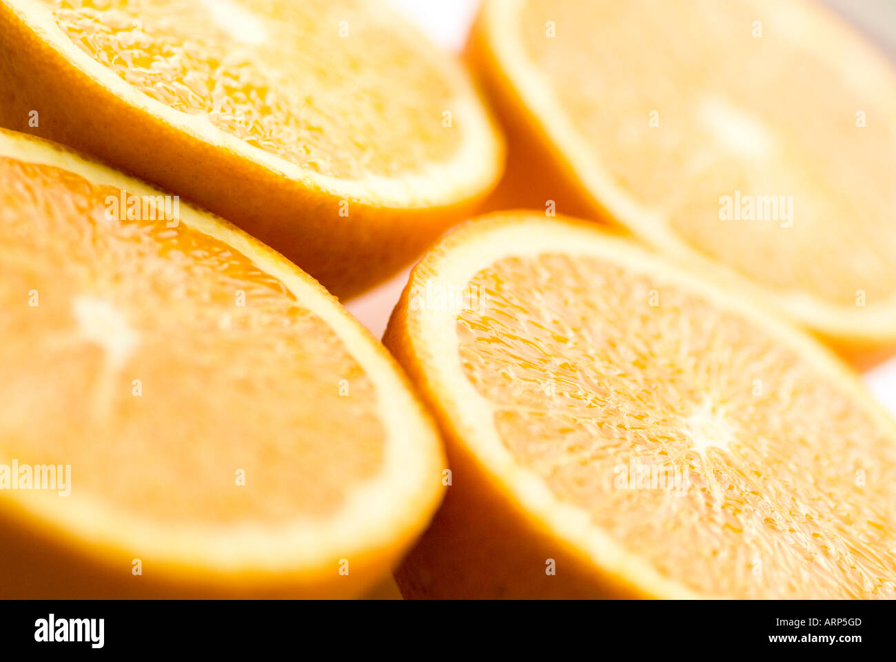 four halves of oranges Stock Photo - Alamy