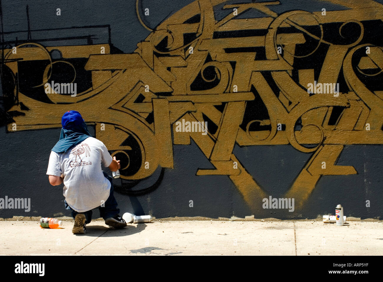 Graffiti artist gold Stock Photo - Alamy