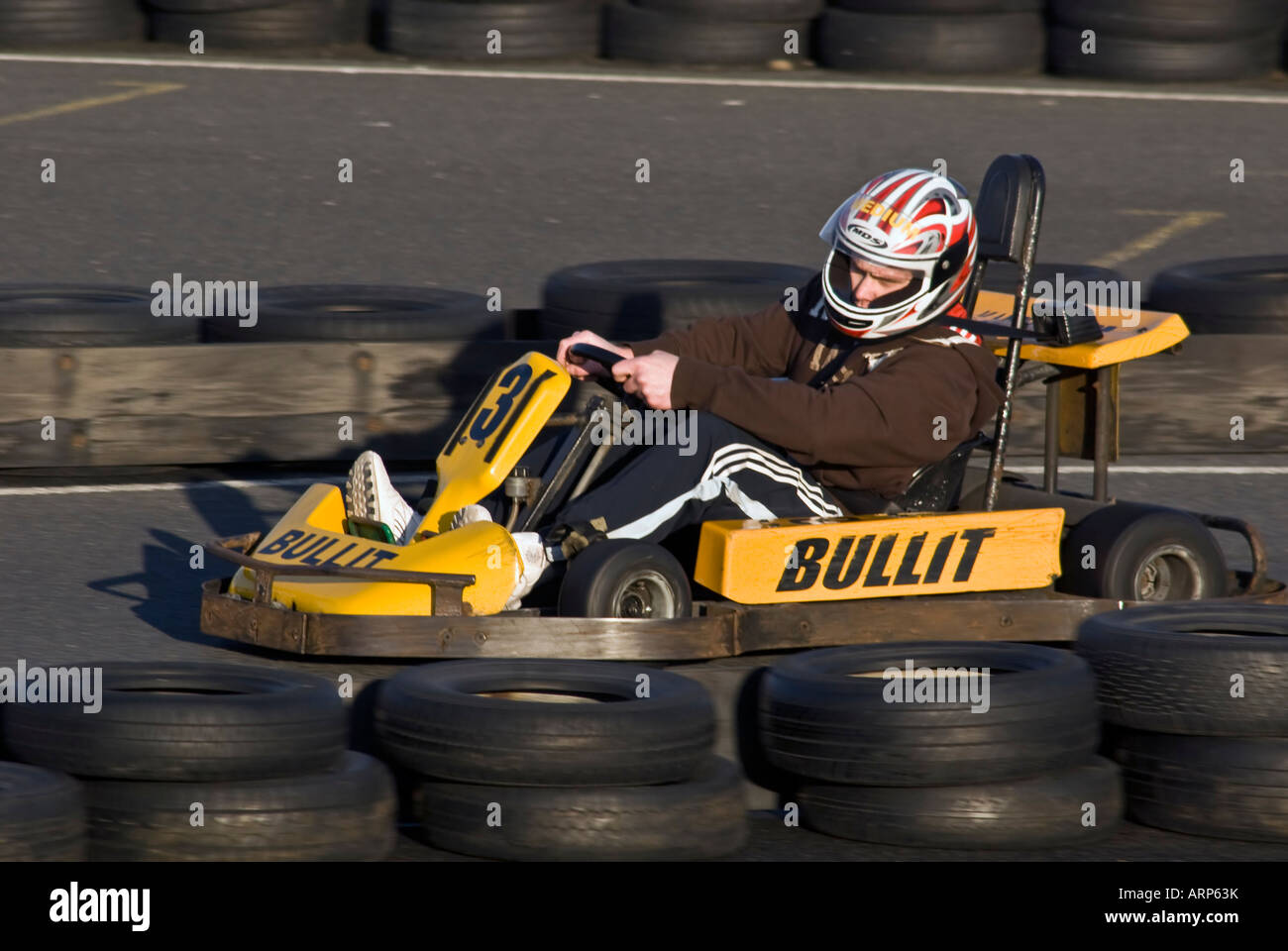Boy racer driving racing [go cart] Stock Photo - Alamy