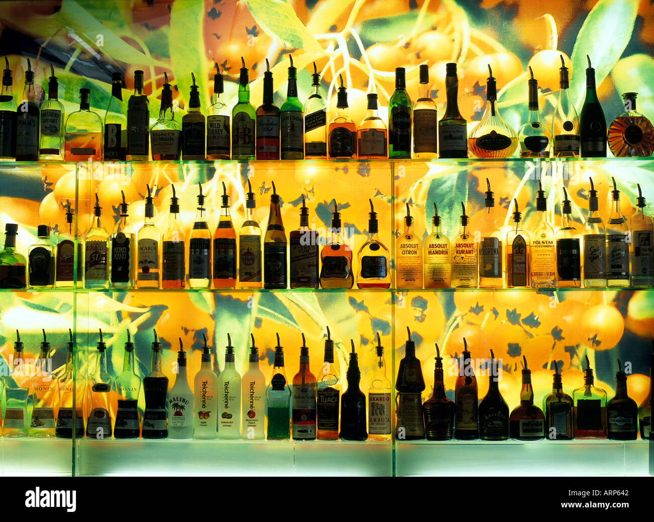 Bottles behind bar Stock Photo - Alamy