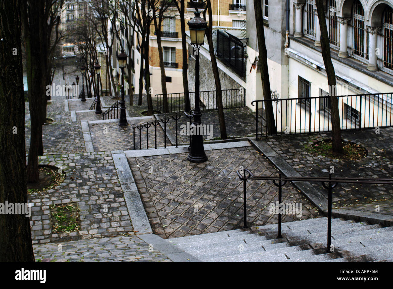 Steps leading down from the Basilica of Sacre Coeur into Montmartre ...