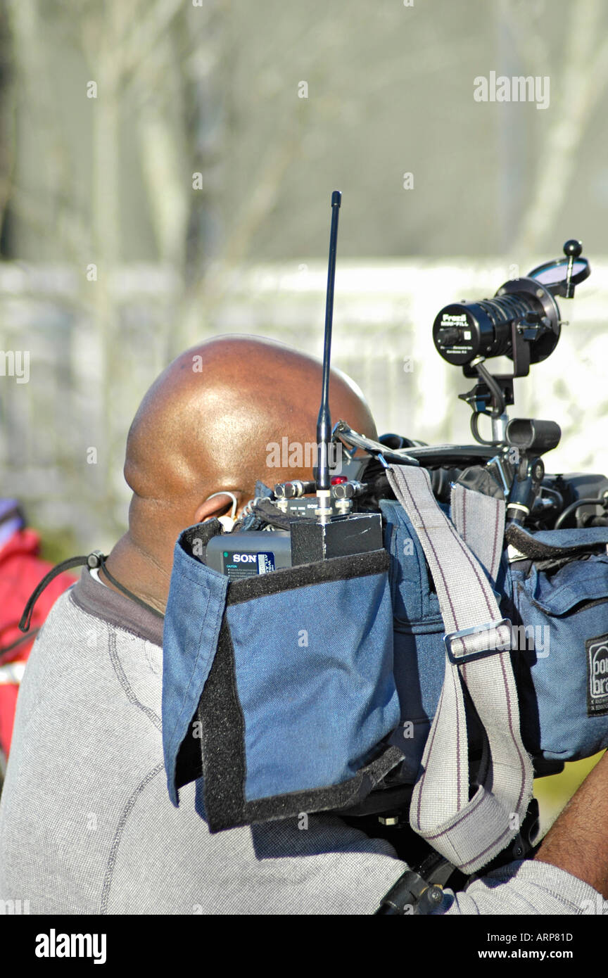 Television cameraman, black photojournalist in Atlanta, FOX at event ...