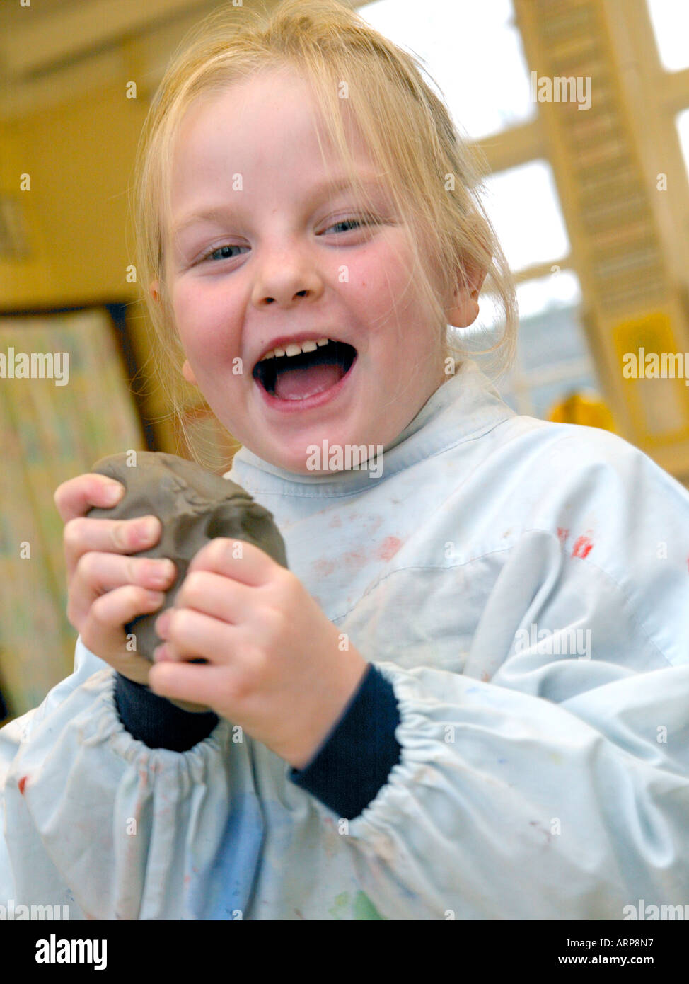 Child moulding clay at primary school Stock Photo - Alamy