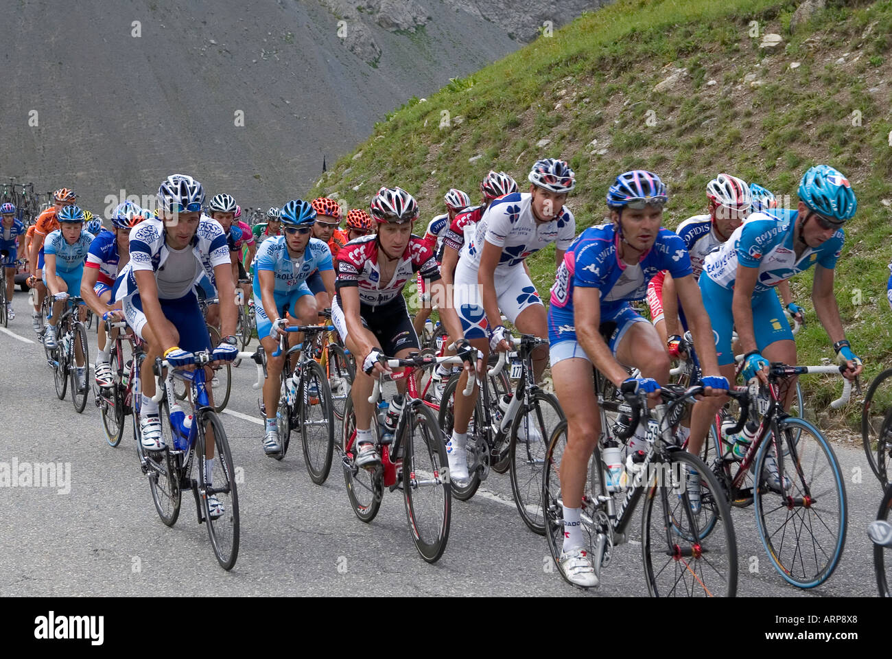 Riders in the Tour de France cycling up the Col du Galibier in the ...