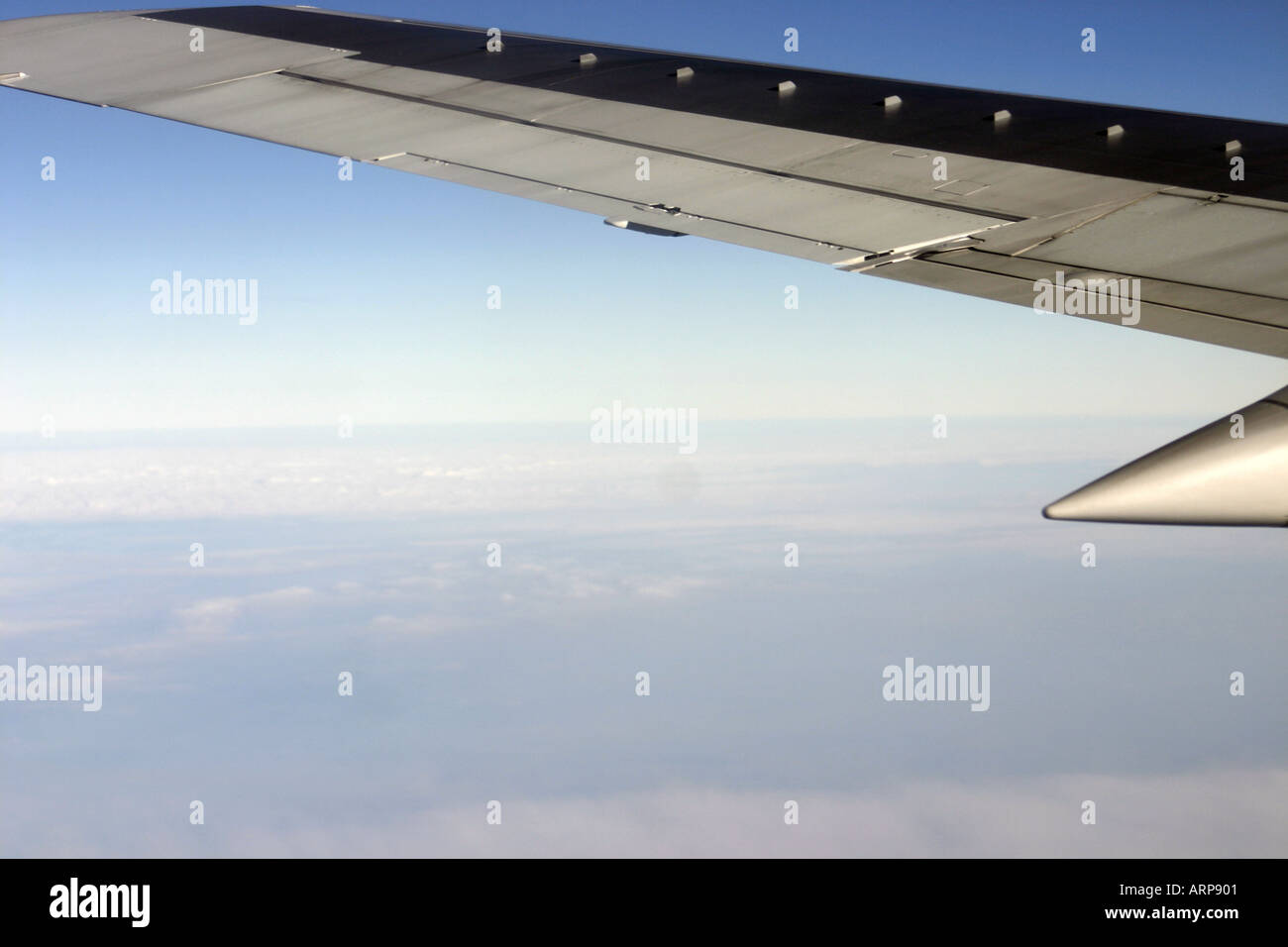 Typical view of aircraft wing from inside Stock Photo - Alamy
