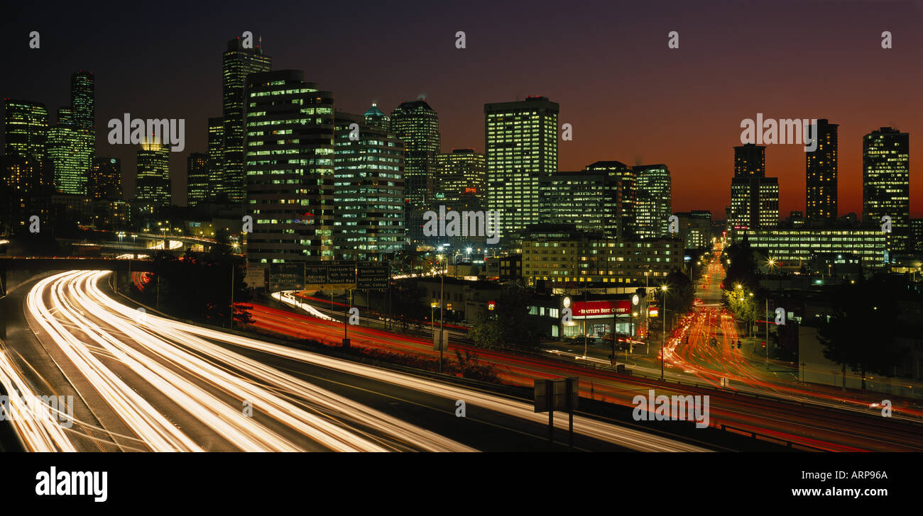Traffic on freeway at night through downtown Seattle Washington Stock ...