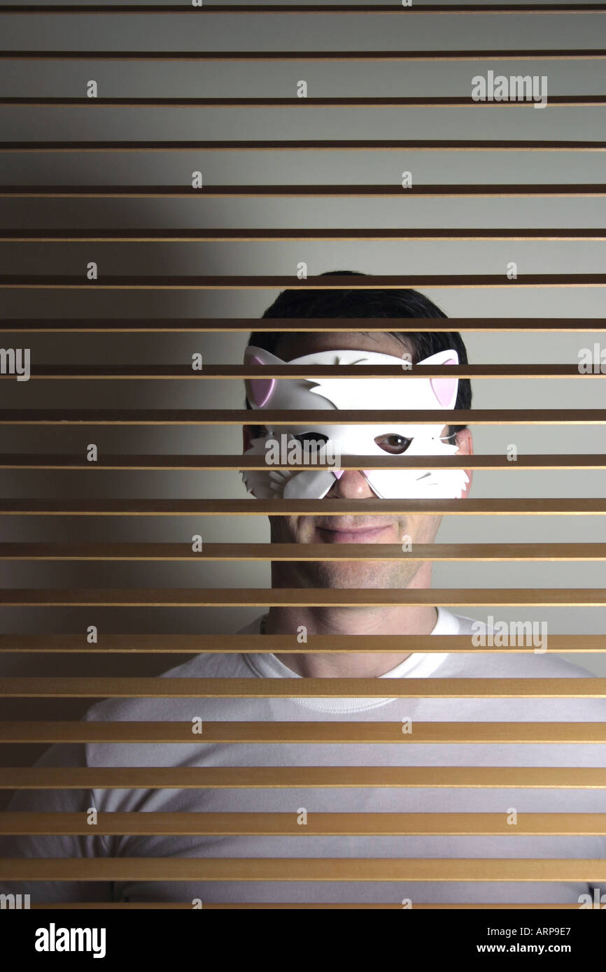 Mask behind curtain hi-res stock photography and images - Alamy