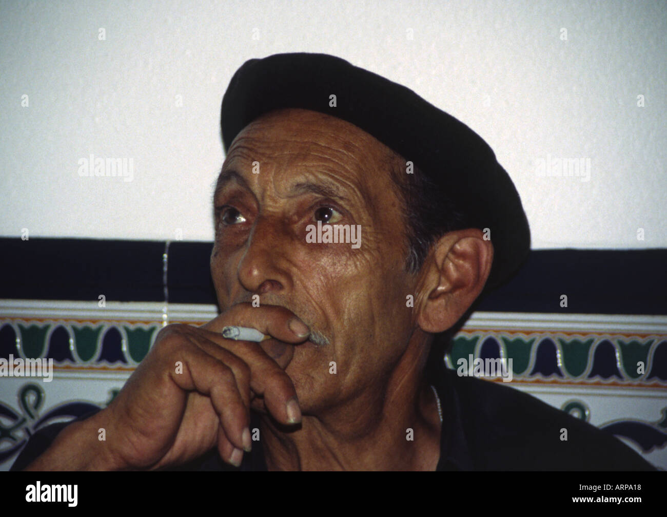 Portuguese Fisherman smoking a cigarette Faro Algarve Portugal Europe ...