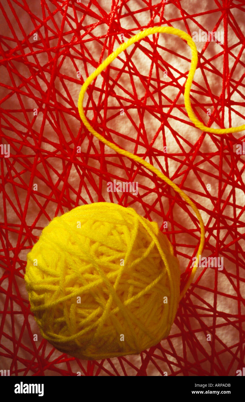 Yellow ball of yarn Stock Photo - Alamy