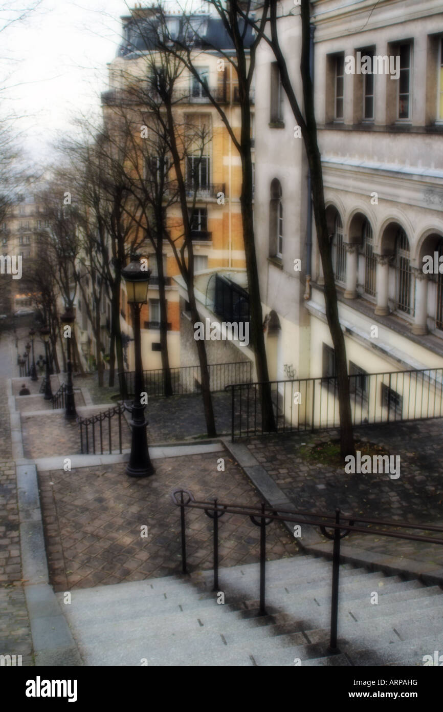 Steps leading down from the Basilica of Sacre Coeur into Montmartre ...