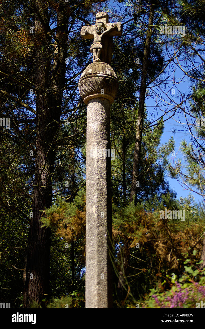 stone cross on a platform with steps and sculpted the crucifix that is ...