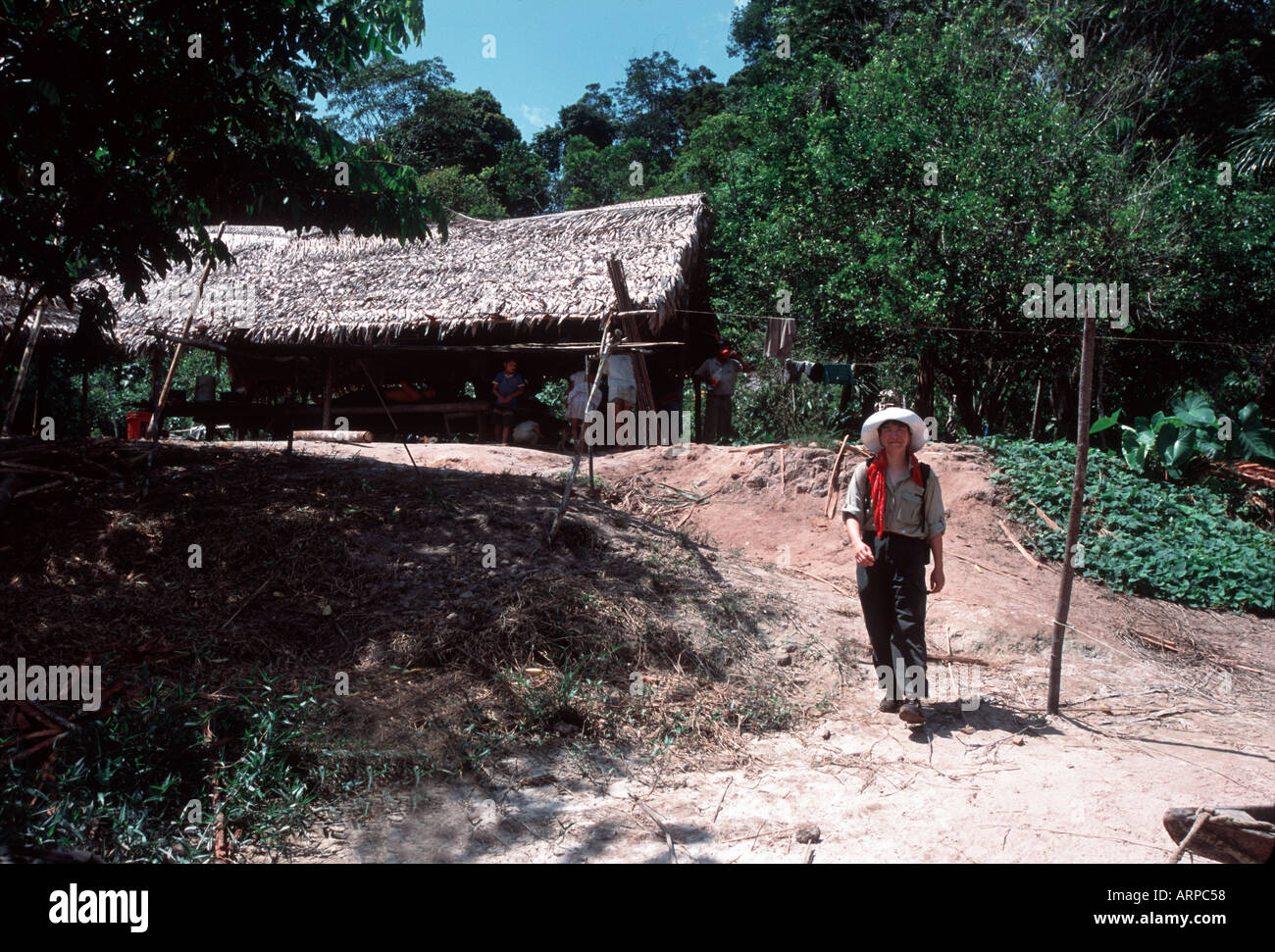 female tourist explores Amazon jungle village Stock Photo - Alamy