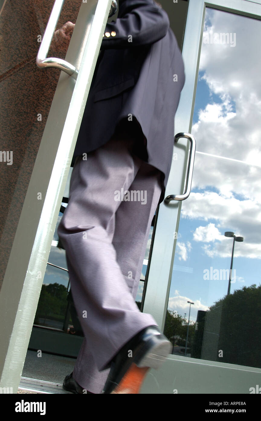 Entering the building hi-res stock photography and images - Alamy