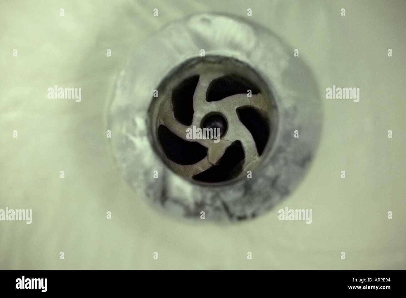 water running down plug hole plughole Stock Photo - Alamy