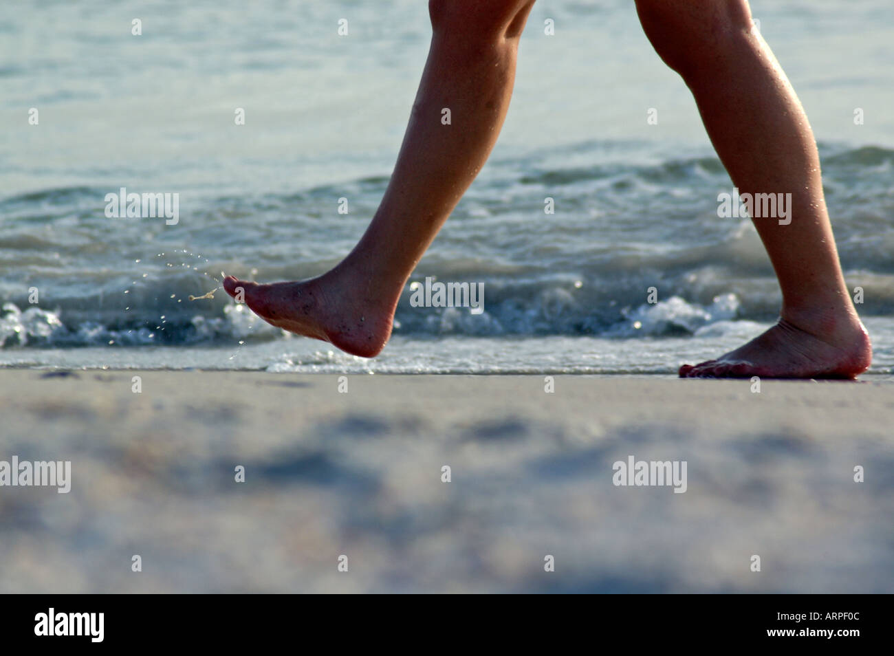 Walking on the Beach Stock Photo - Alamy