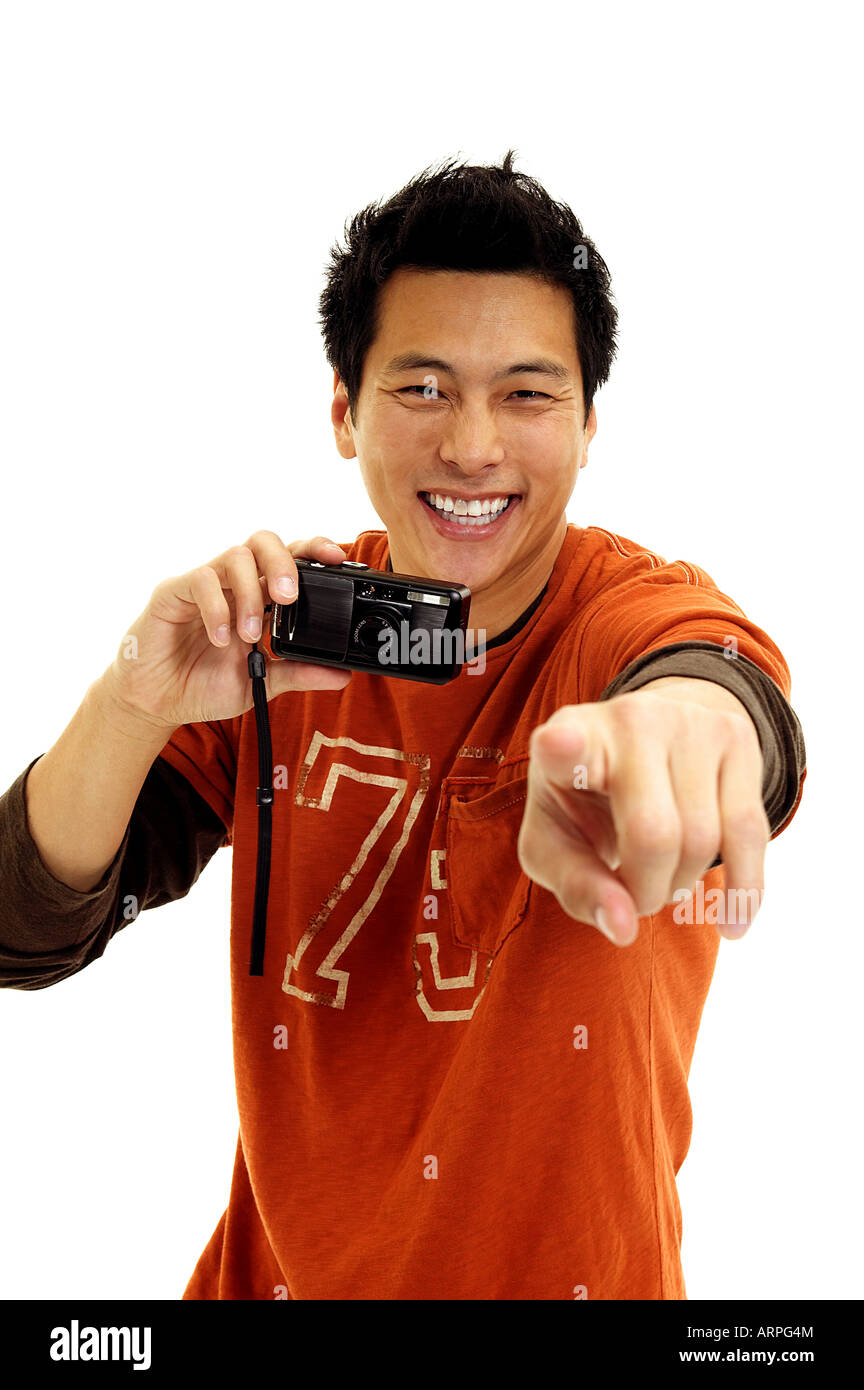 Young Man Holding Camera and Pointing Stock Photo - Alamy