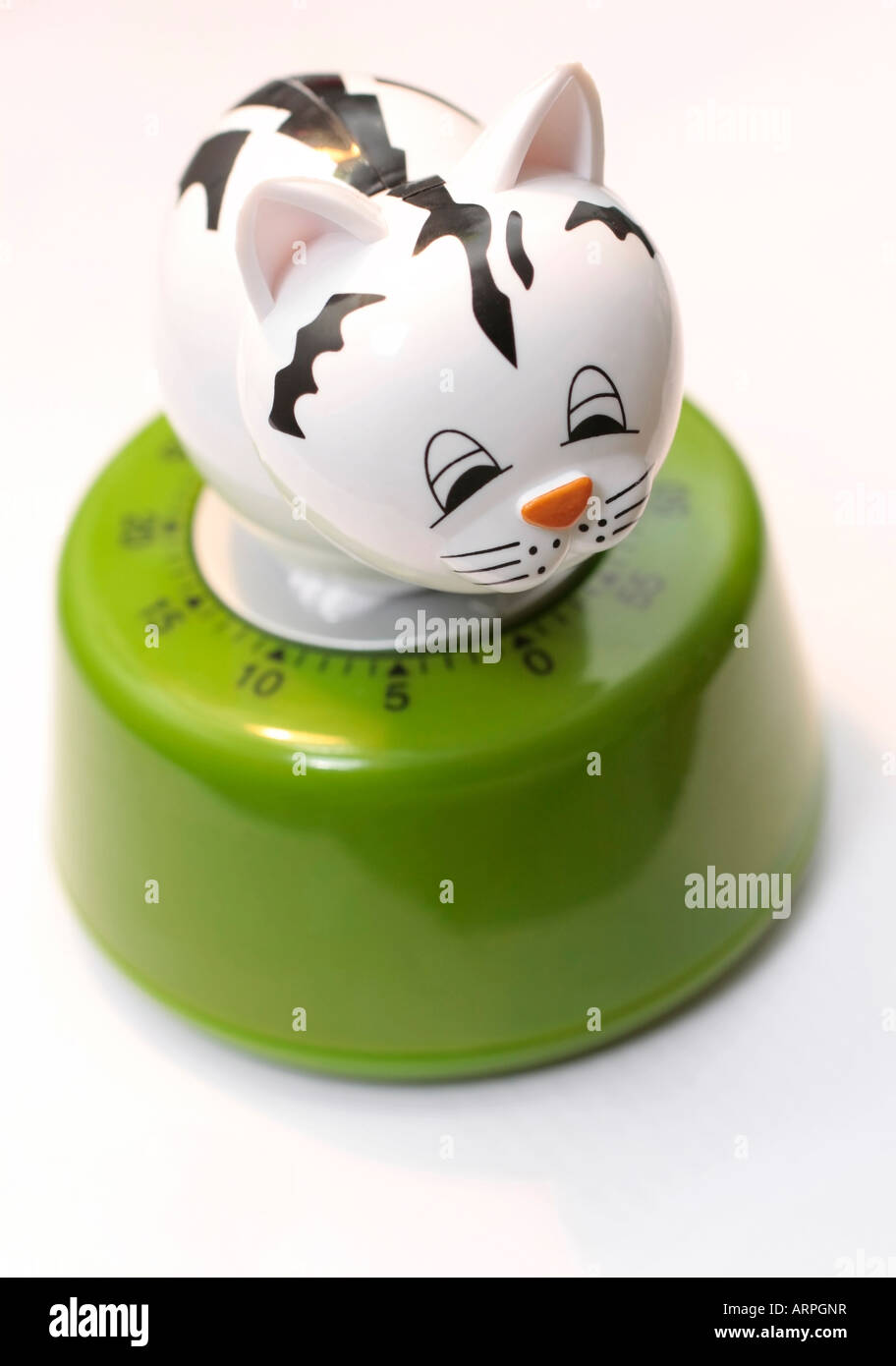 Close up of a novelty Kitchen Timer in the shape of a black and white ...