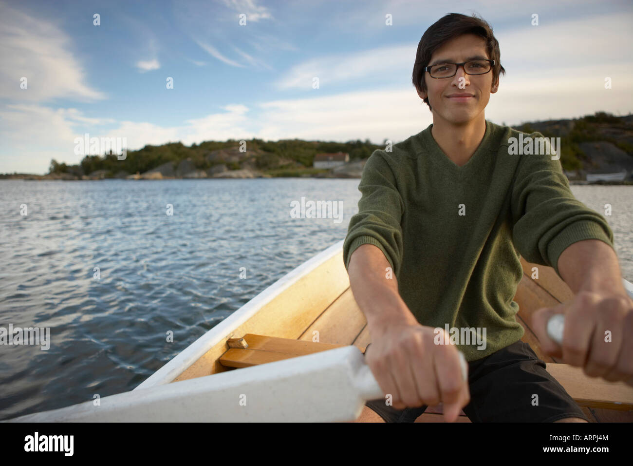 Man with rowing boat hi-res stock photography and images - Alamy