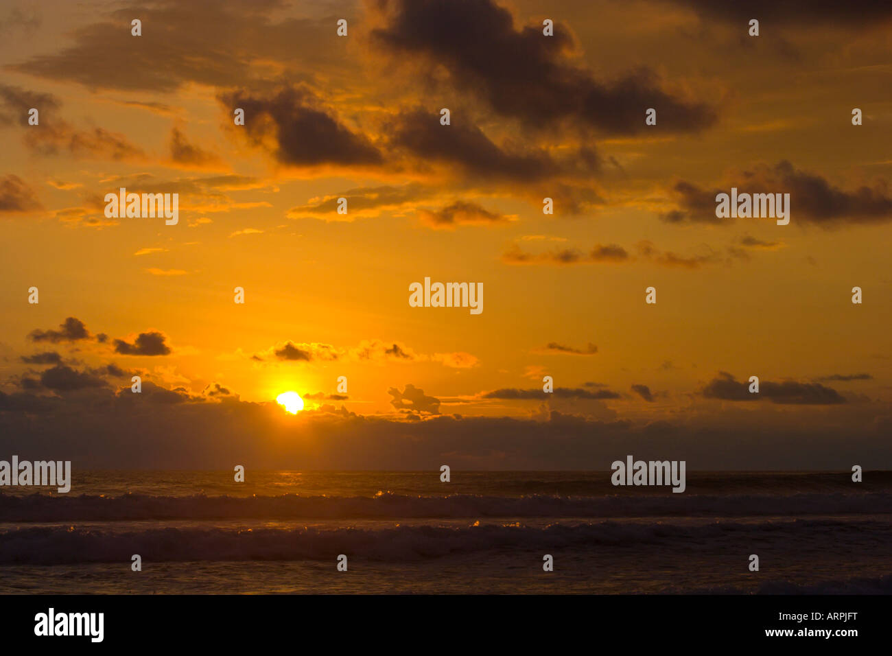 Costa Rican sunset at Dominical Stock Photo - Alamy