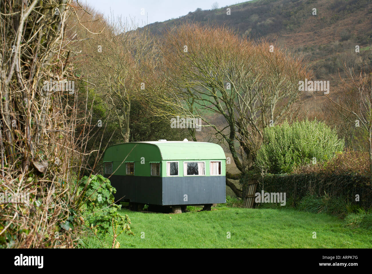 old green caravan in small field in winter Stock Photo - Alamy