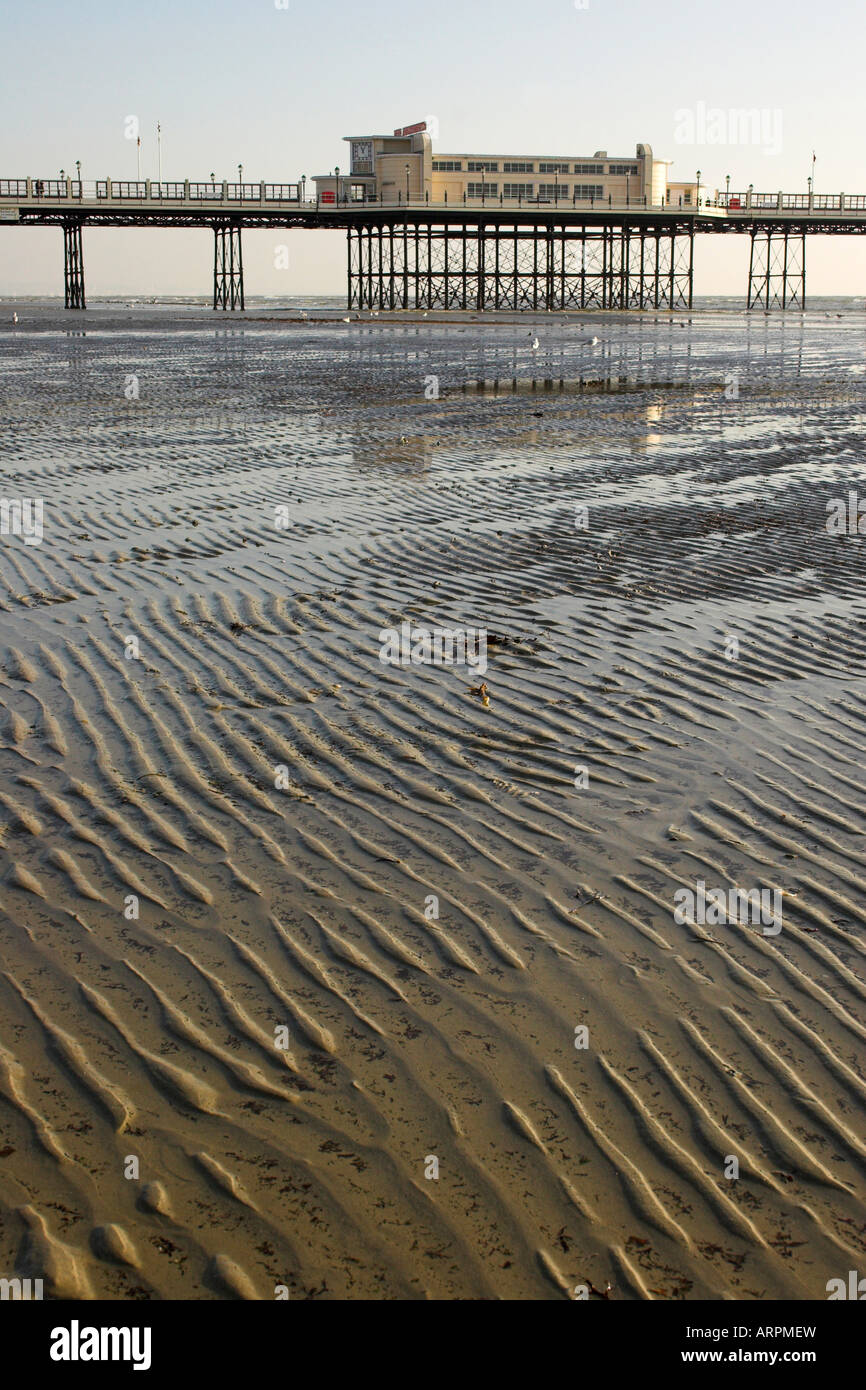 The central section (amusement arcade) of Worthing Pier (exposed at low ...
