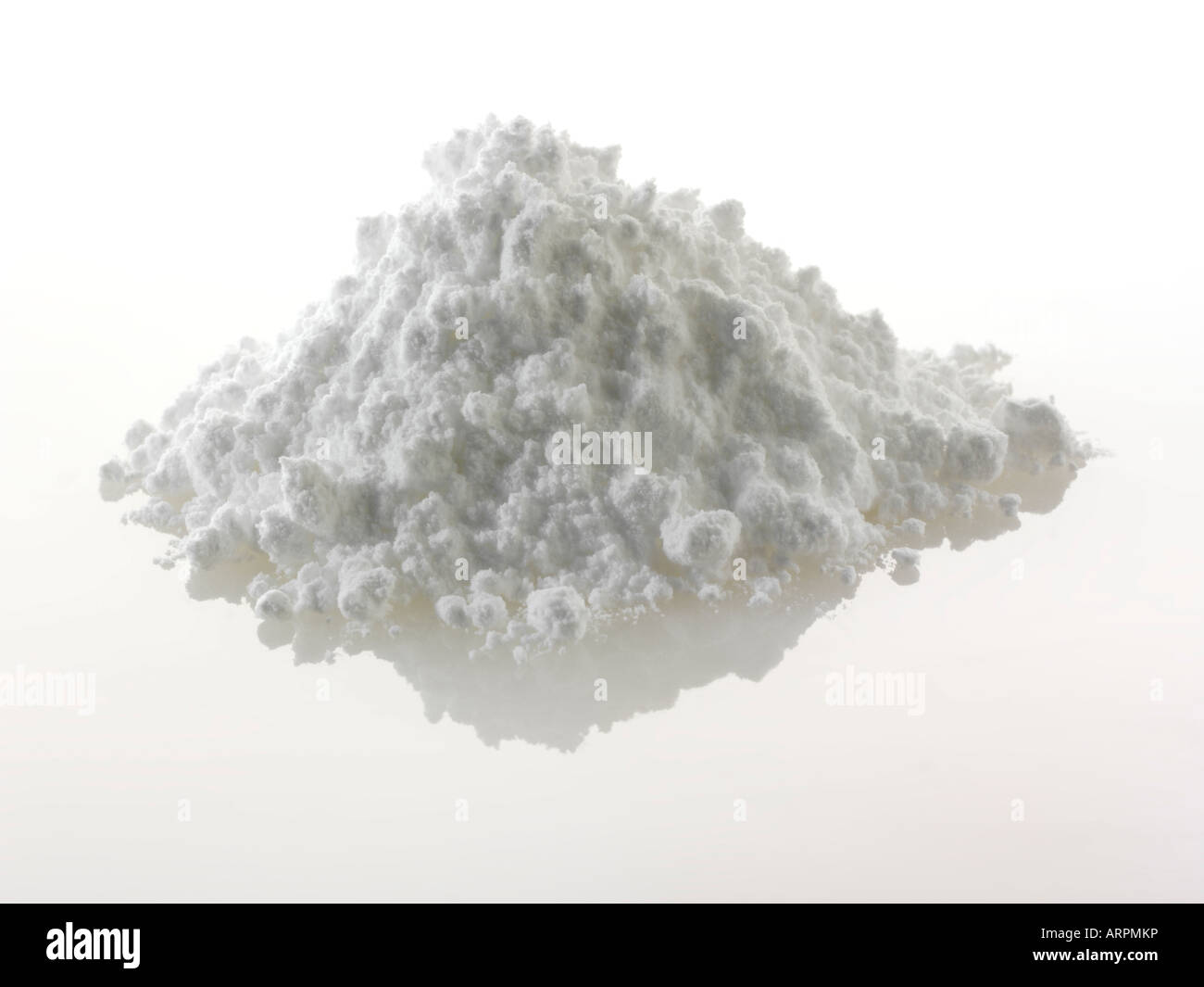 Icing sugar against a white background to cut out Stock Photo - Alamy