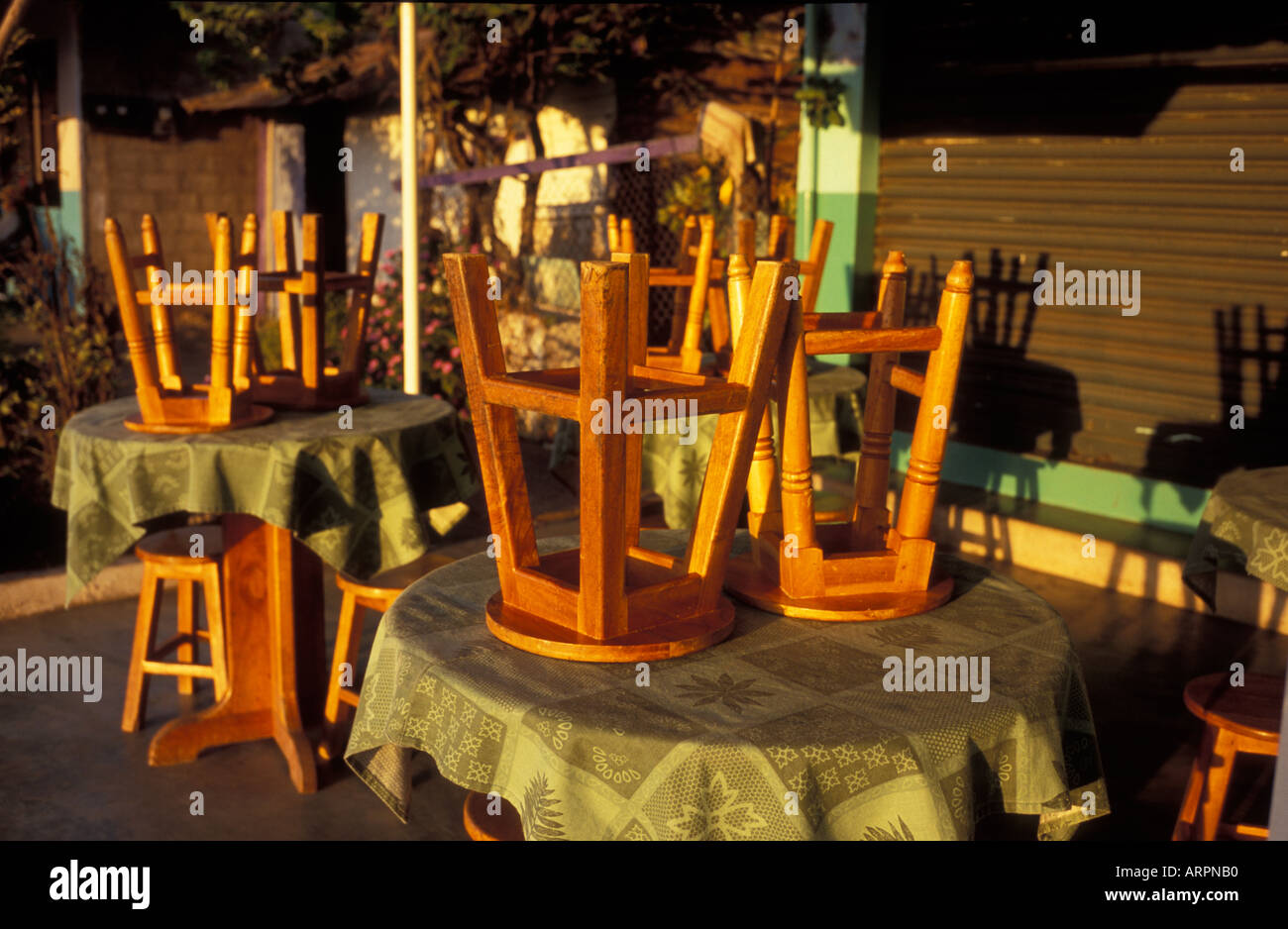 Chairs on tables Stock Photo - Alamy