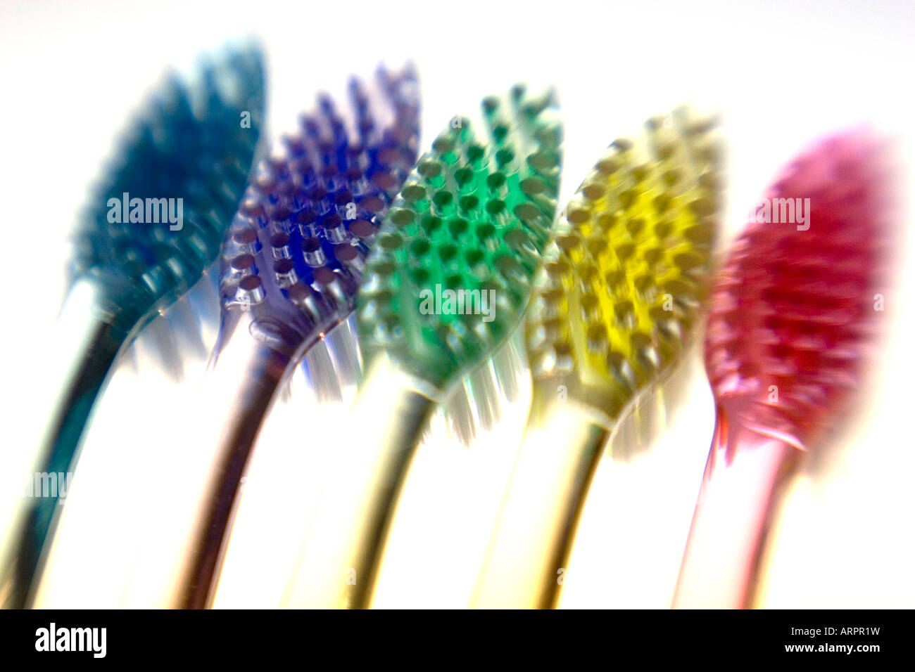 Five colorful toothbrushes Stock Photo - Alamy