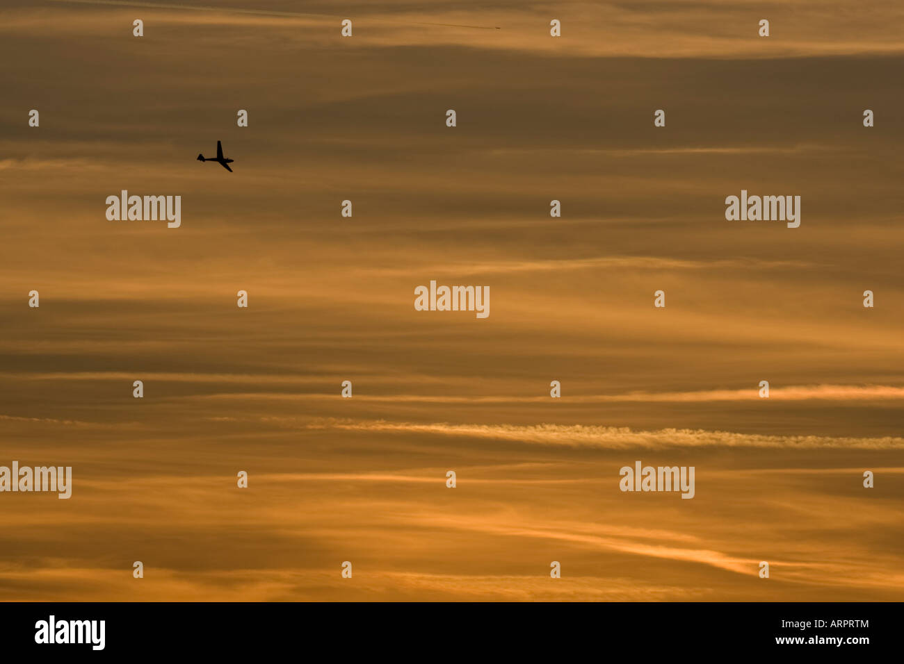 Glider at sunset Stock Photo - Alamy