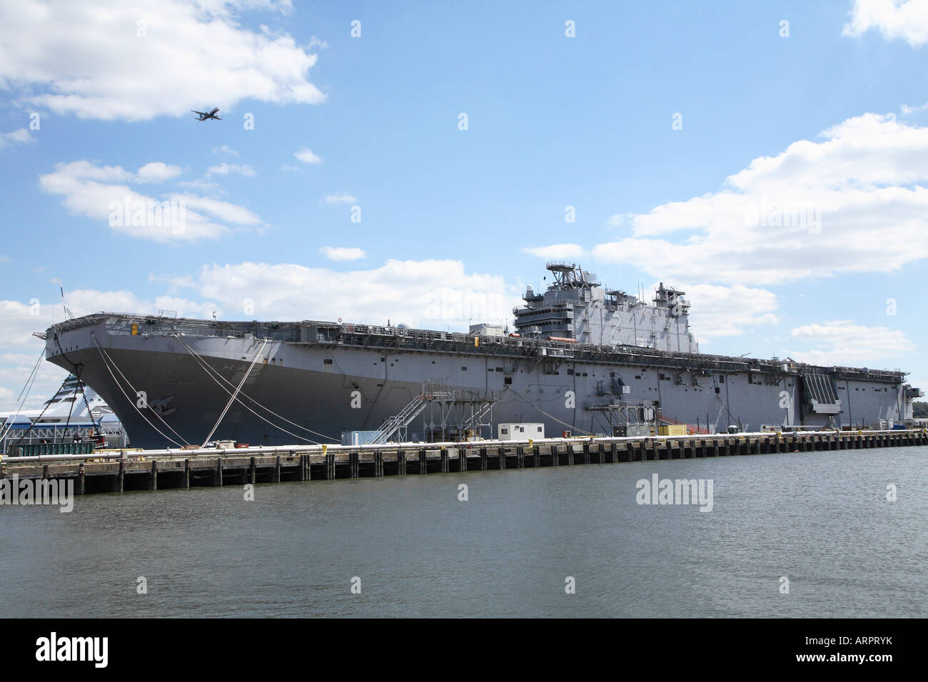 Amphibious Assault Ship the Saipan (LHA 2) from side, moored at narrow ...