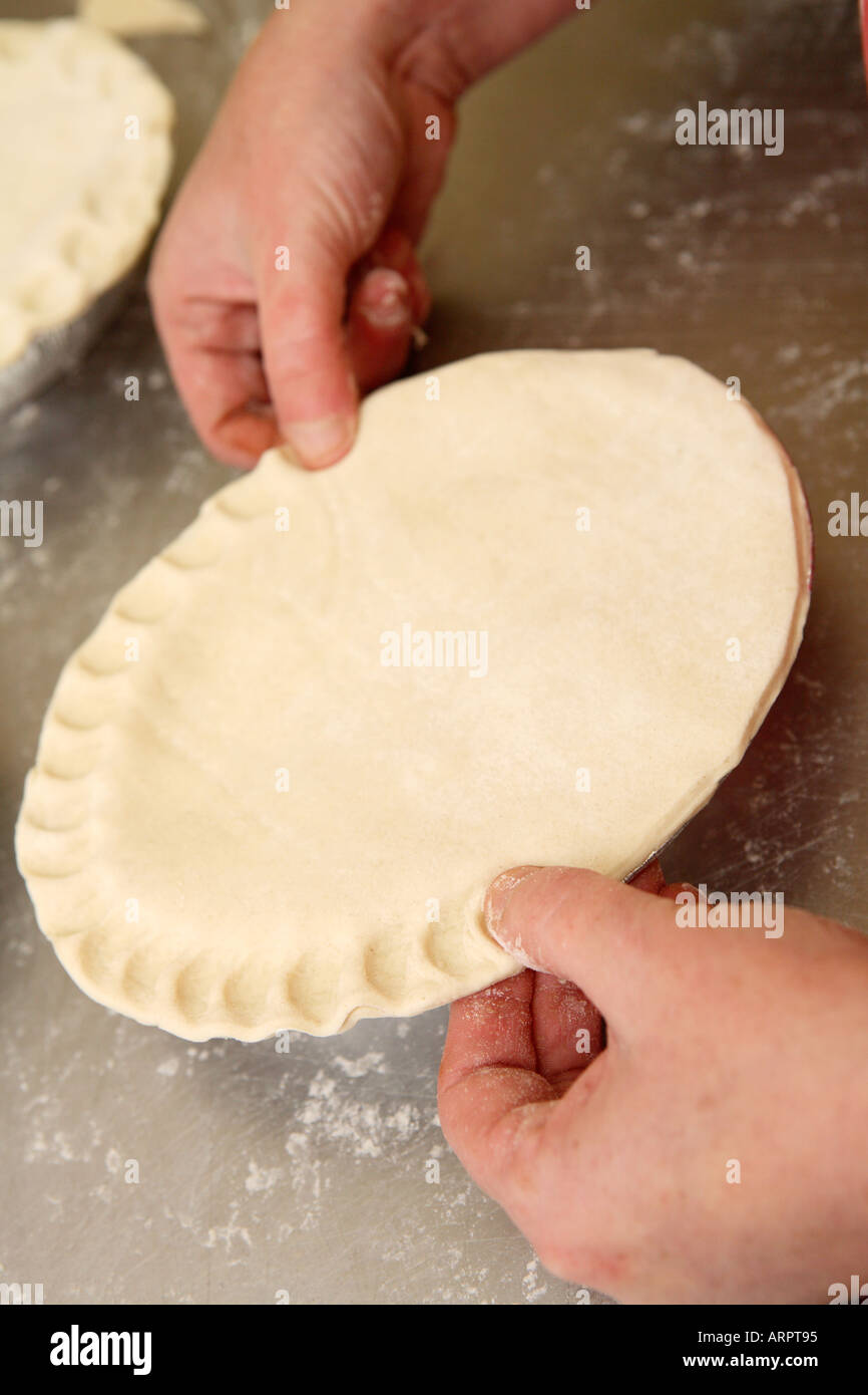 Making Pies Pinching Lids Shut Stock Photo - Alamy