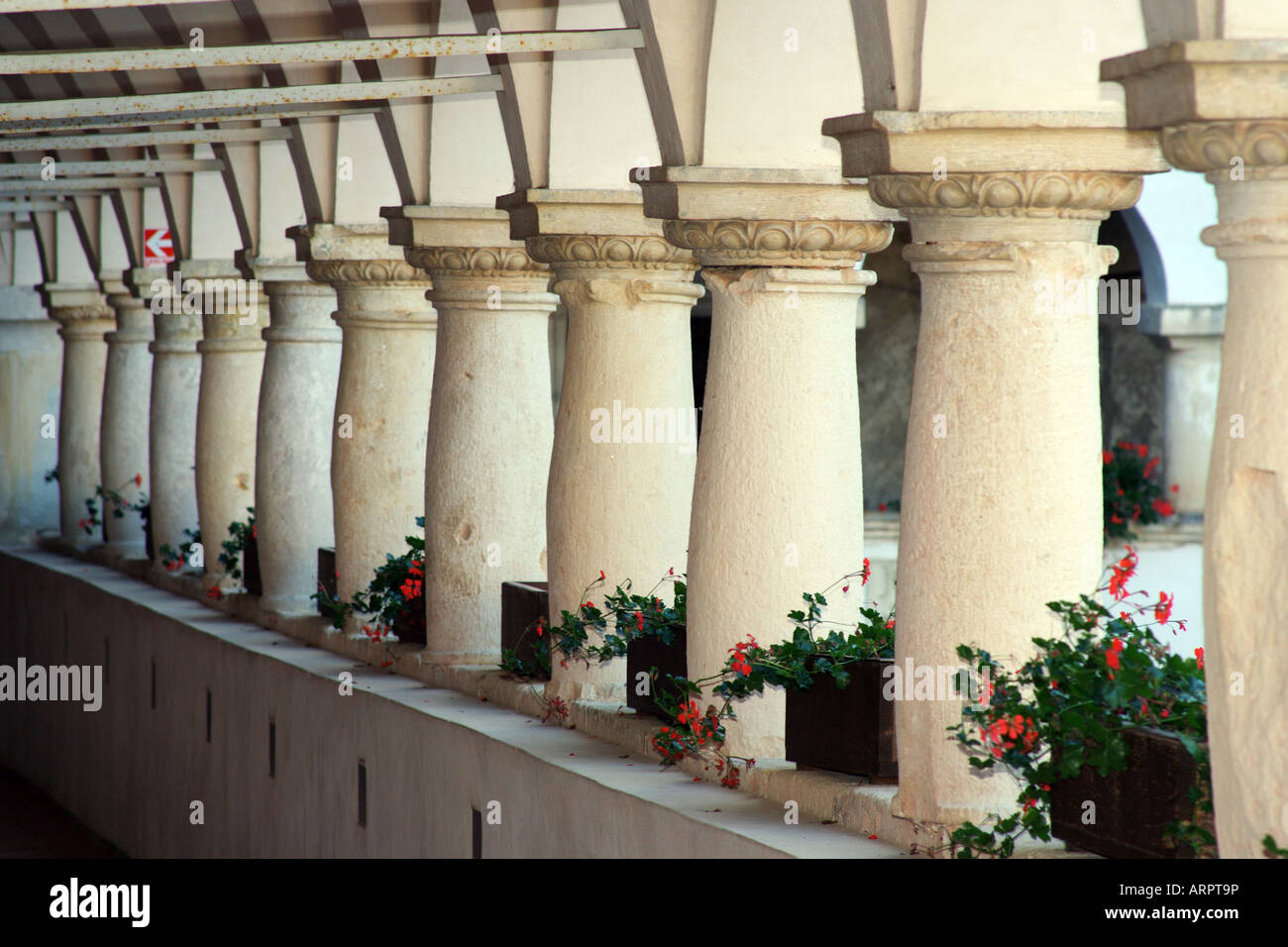 Beautiful arcades in the castle Stock Photo - Alamy