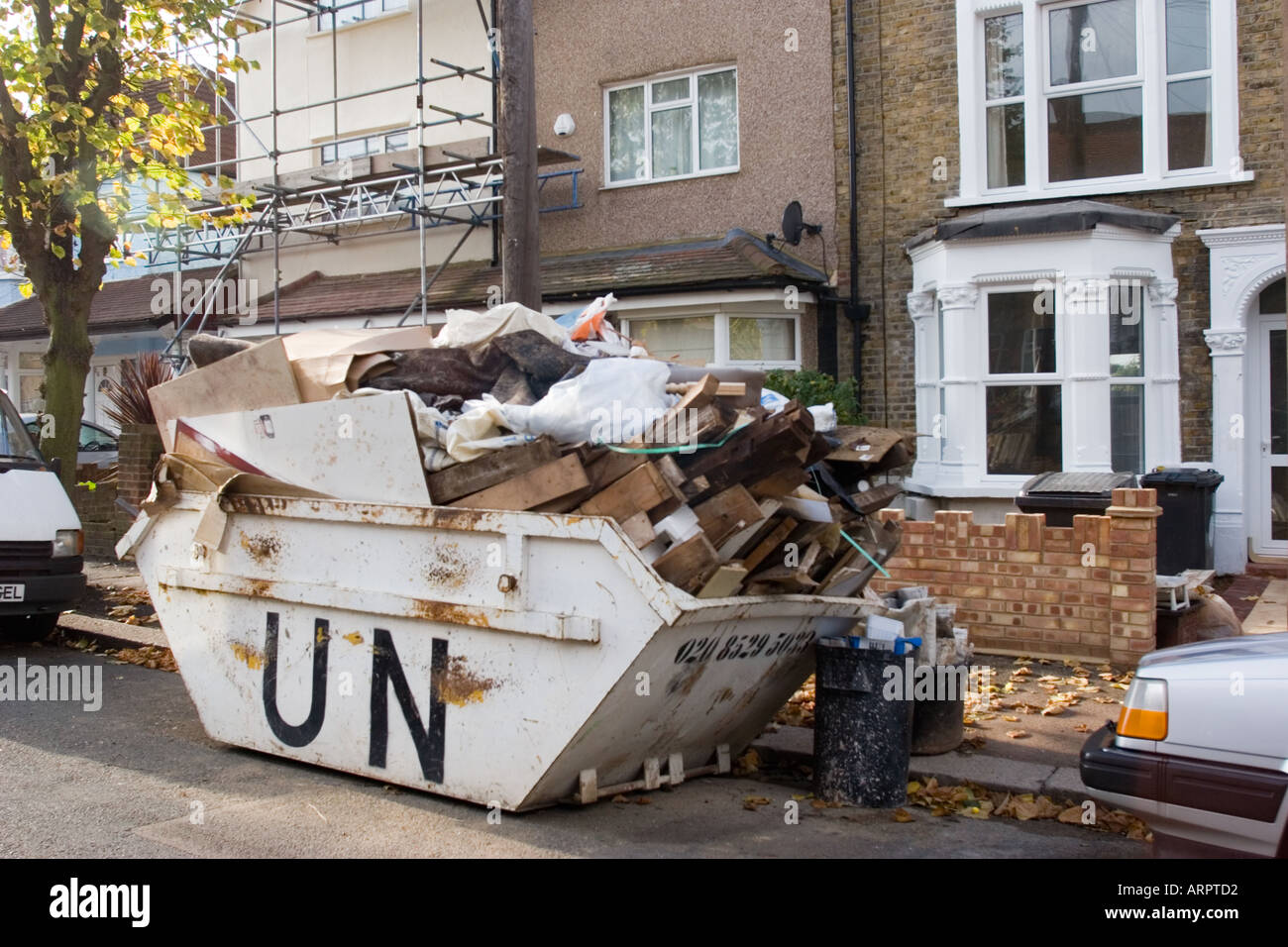 Overloaded skip hi-res stock photography and images - Alamy