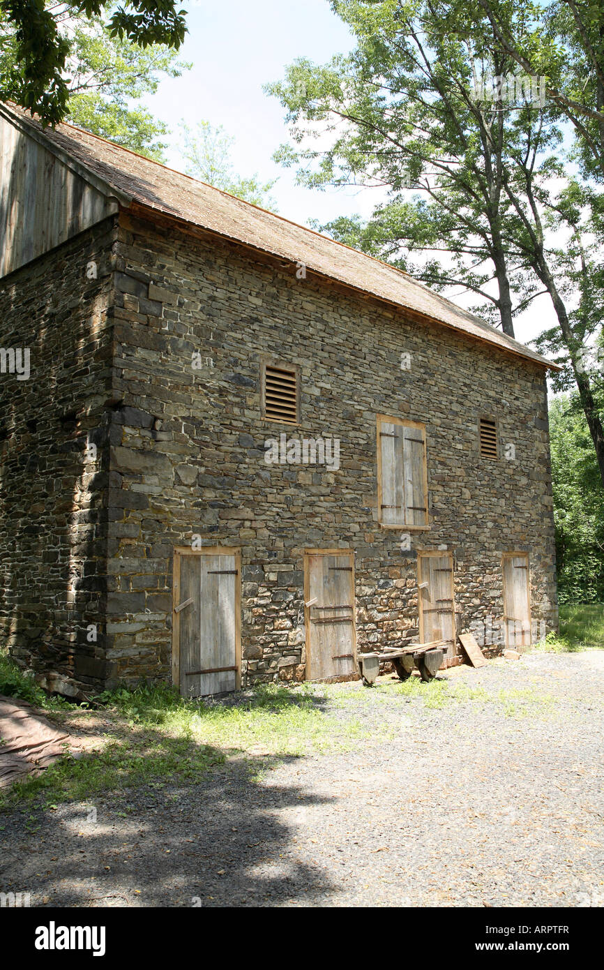 Stone barn with wooden shingled roof Stock Photo - Alamy