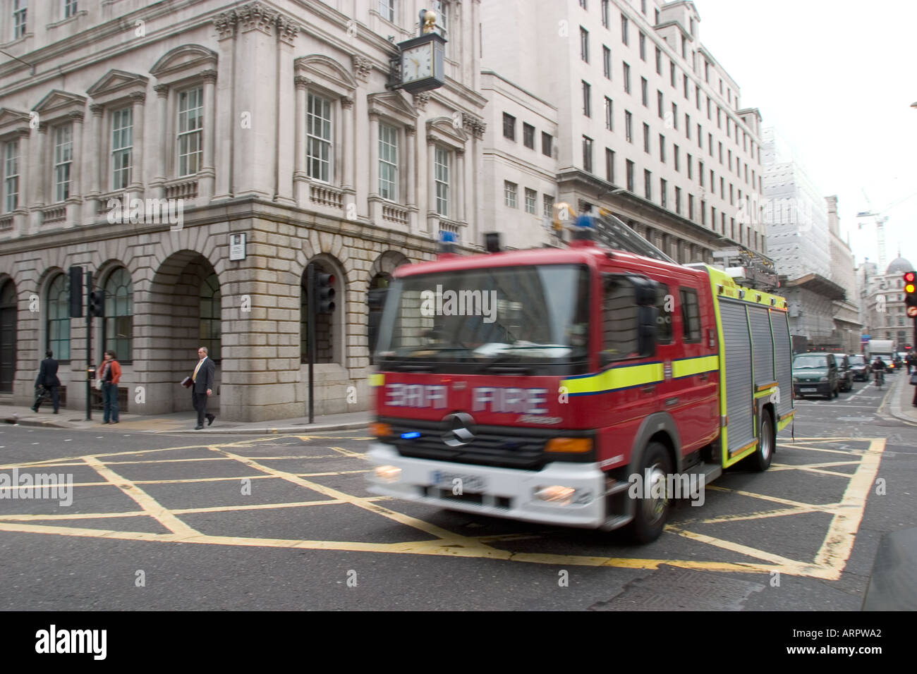 Fire engine on emergency call in the City of London GB UK Stock Photo ...