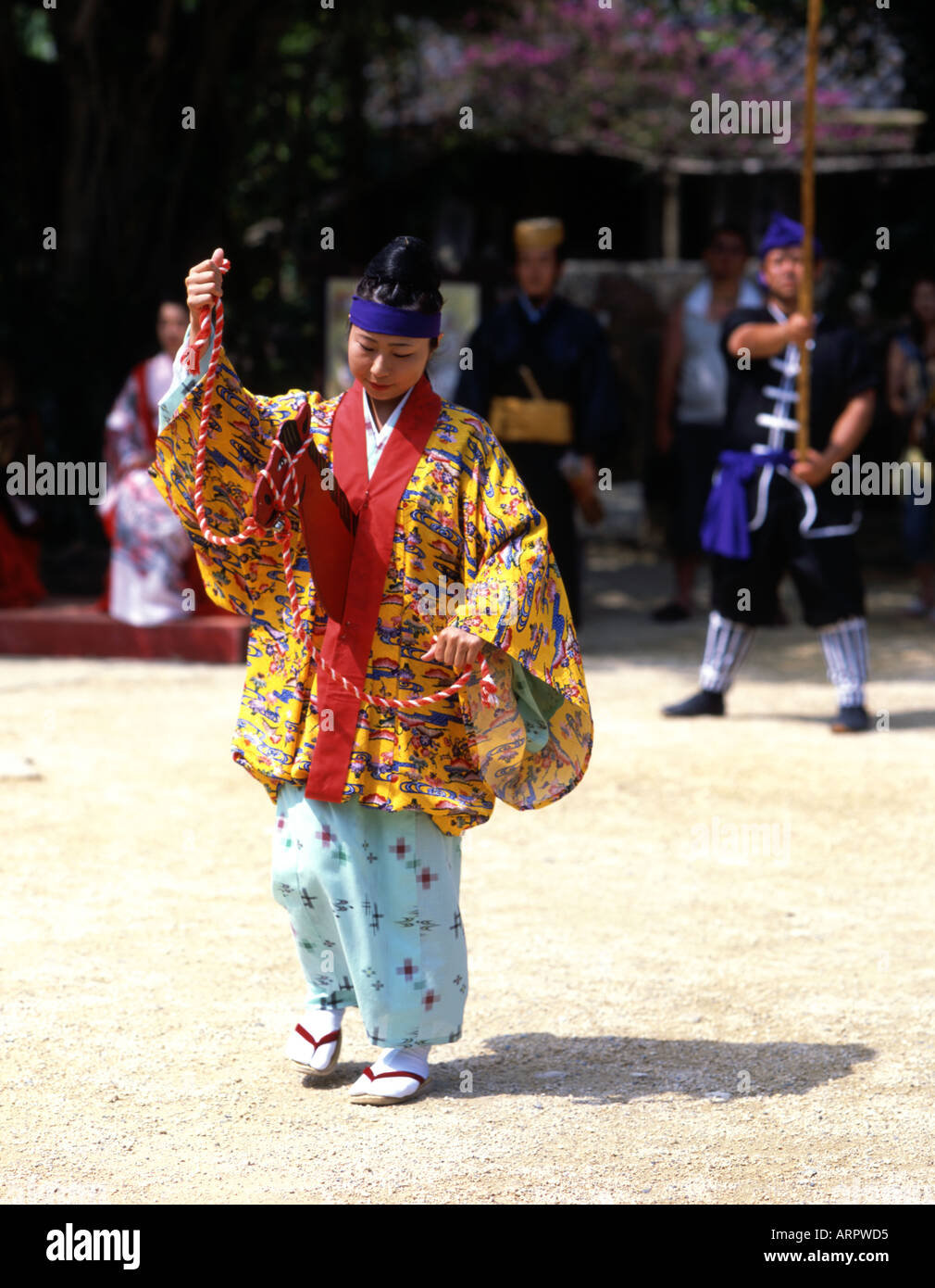 Okinawan woman in traditional costume performs horse dance Stock Photo ...