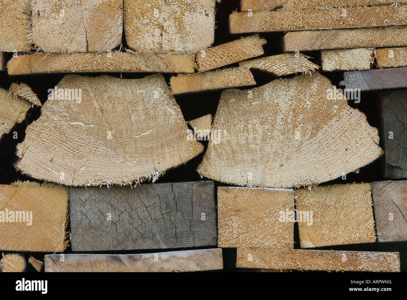 Log ends wood pile Stock Photo - Alamy