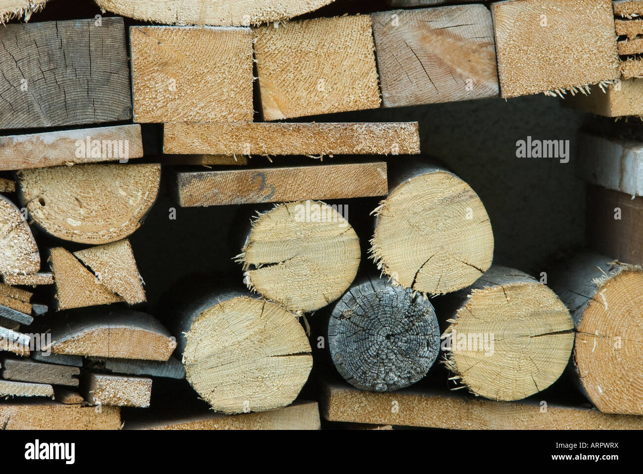 Log ends wood pile Stock Photo - Alamy