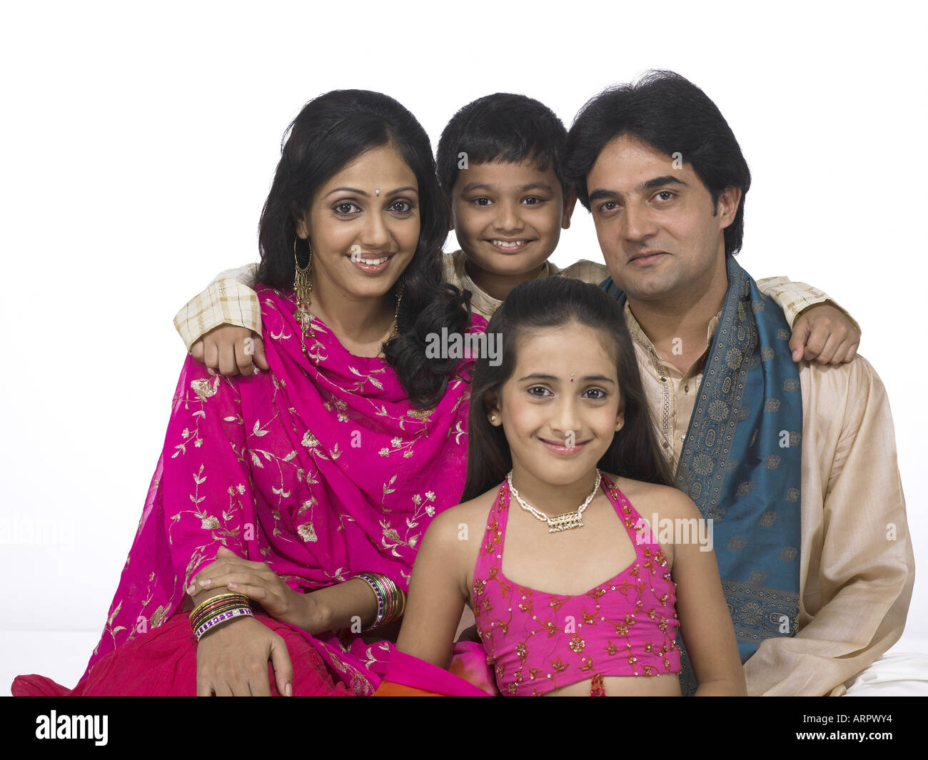 South Asian Indian family with father mother son and daughter Stock ...