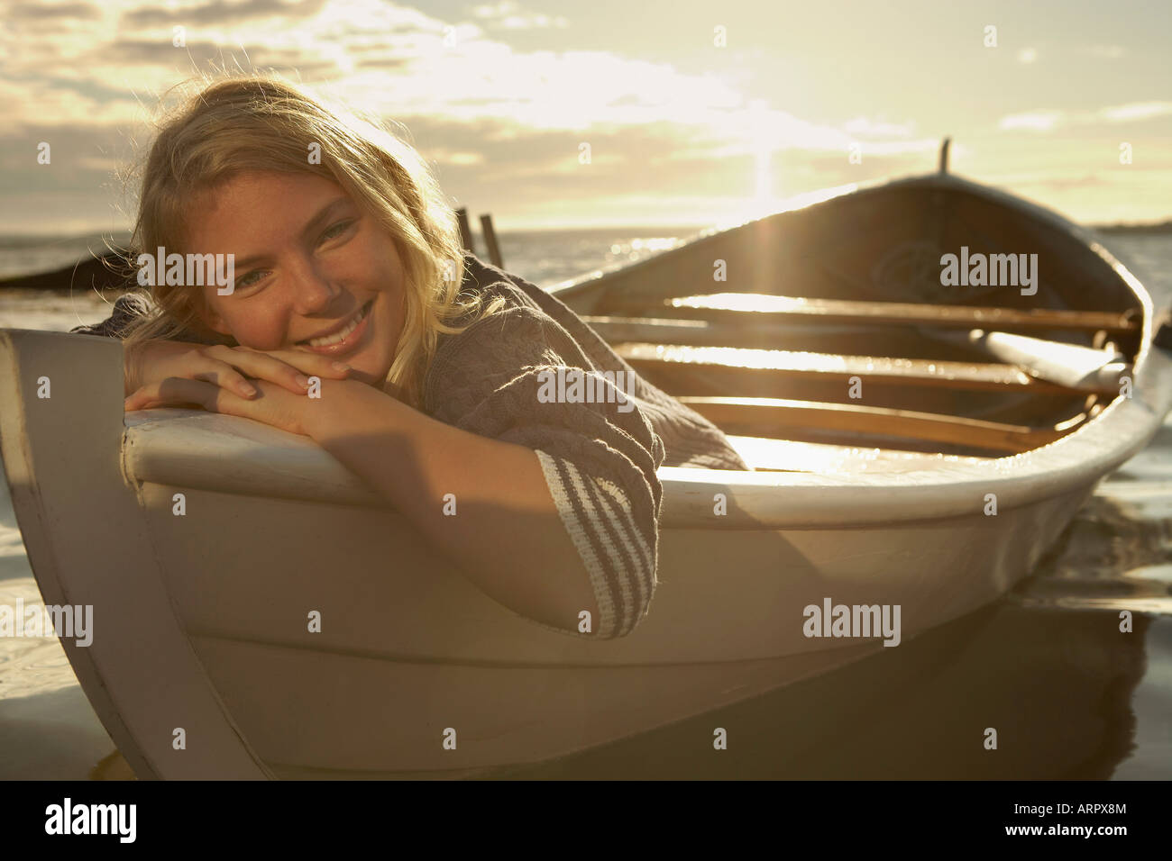 Woman lying in rowing hi-res stock photography and images - Alamy