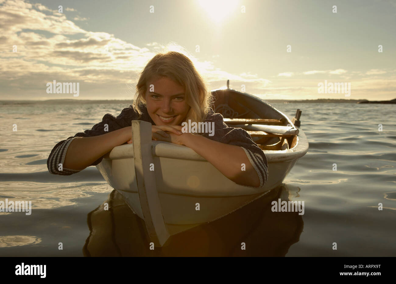 Woman lying in rowing hi-res stock photography and images - Alamy