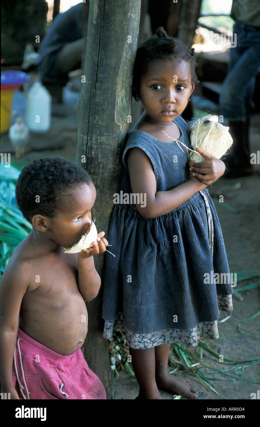 AFRICA KENYA KALIFI Kenyan children eating coconuts Stock Photo - Alamy