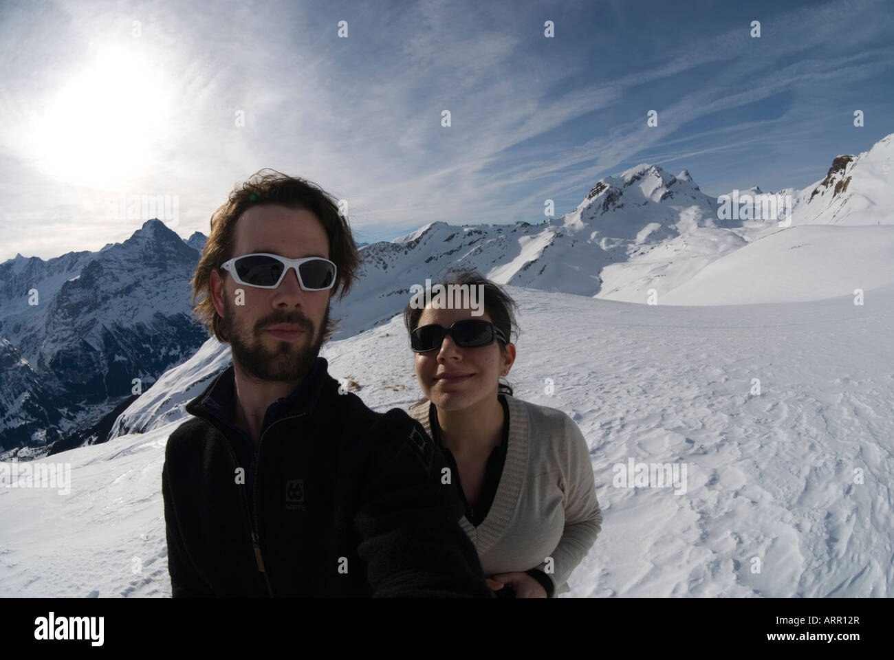 Enjoying the sunshine high in the Swiss alps Stock Photo - Alamy