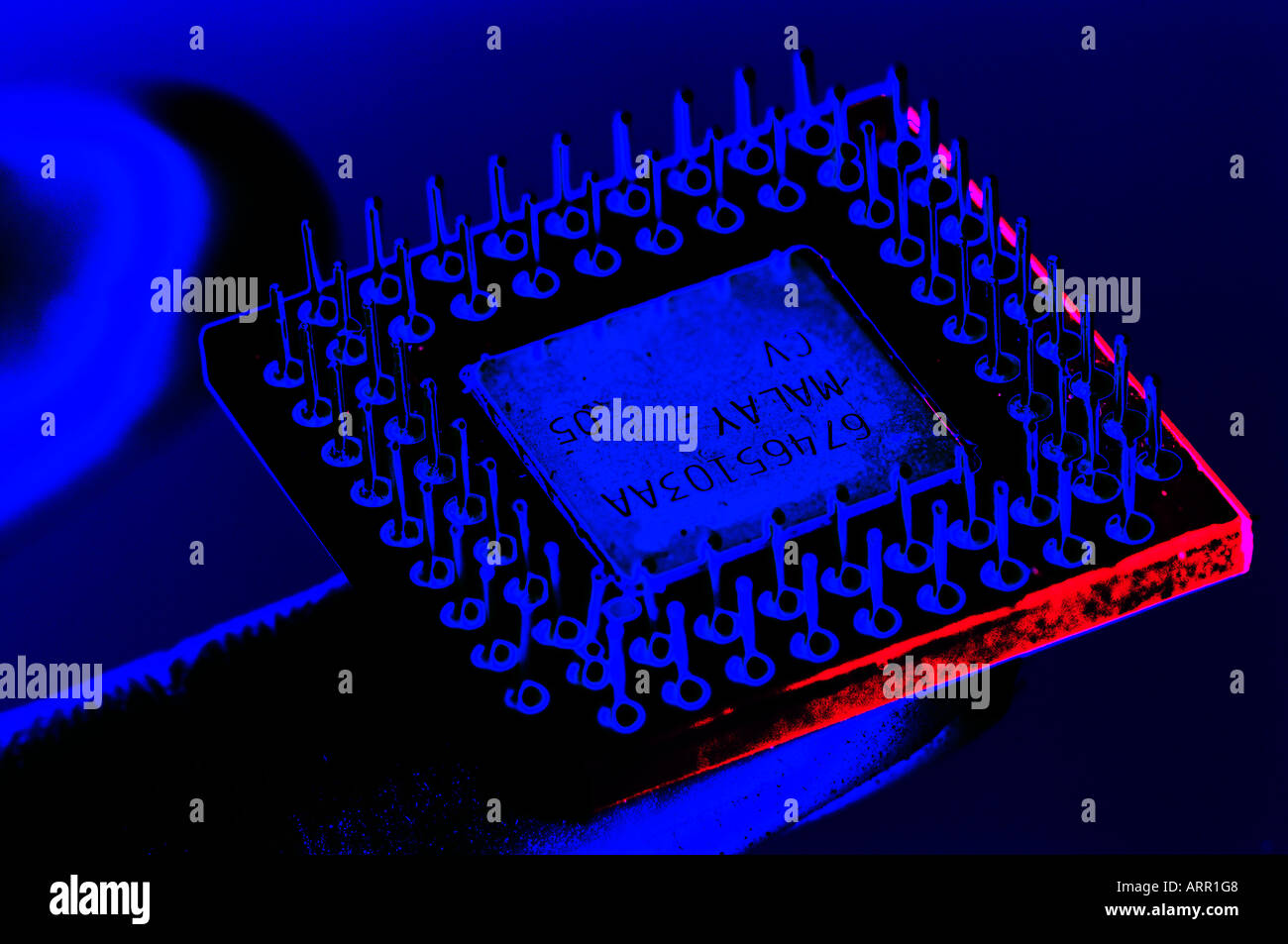 tiny computer processor chip balanced on tip of human finger Stock ...