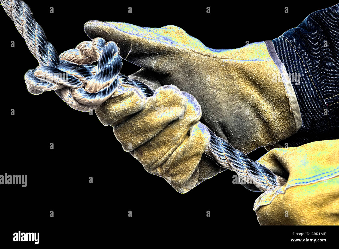 hands leather gloves holding heavy rope Stock Photo - Alamy