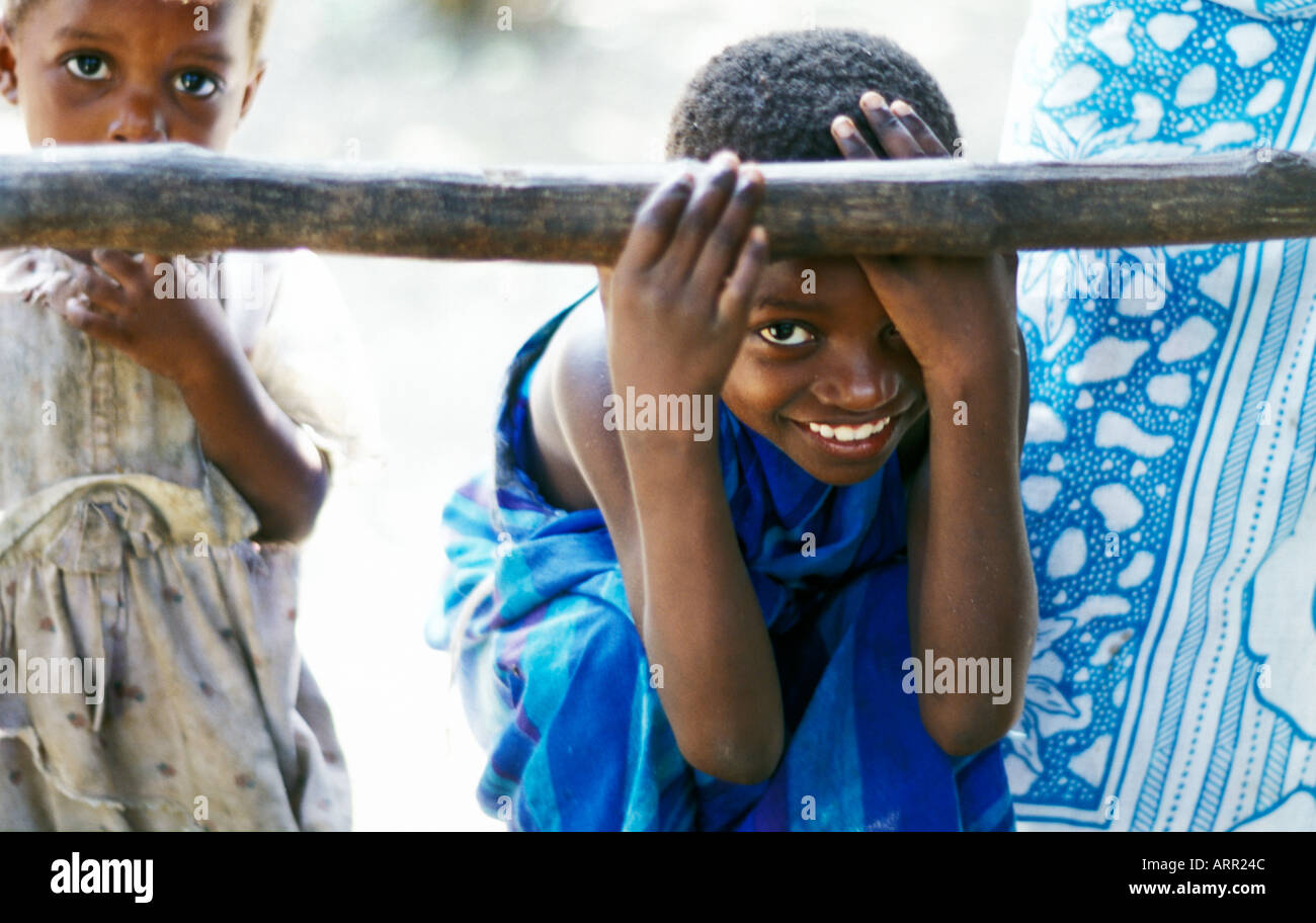 AFRICA KENYA KALIFI Young Kenyan girls play peek a boo with visitors as ...