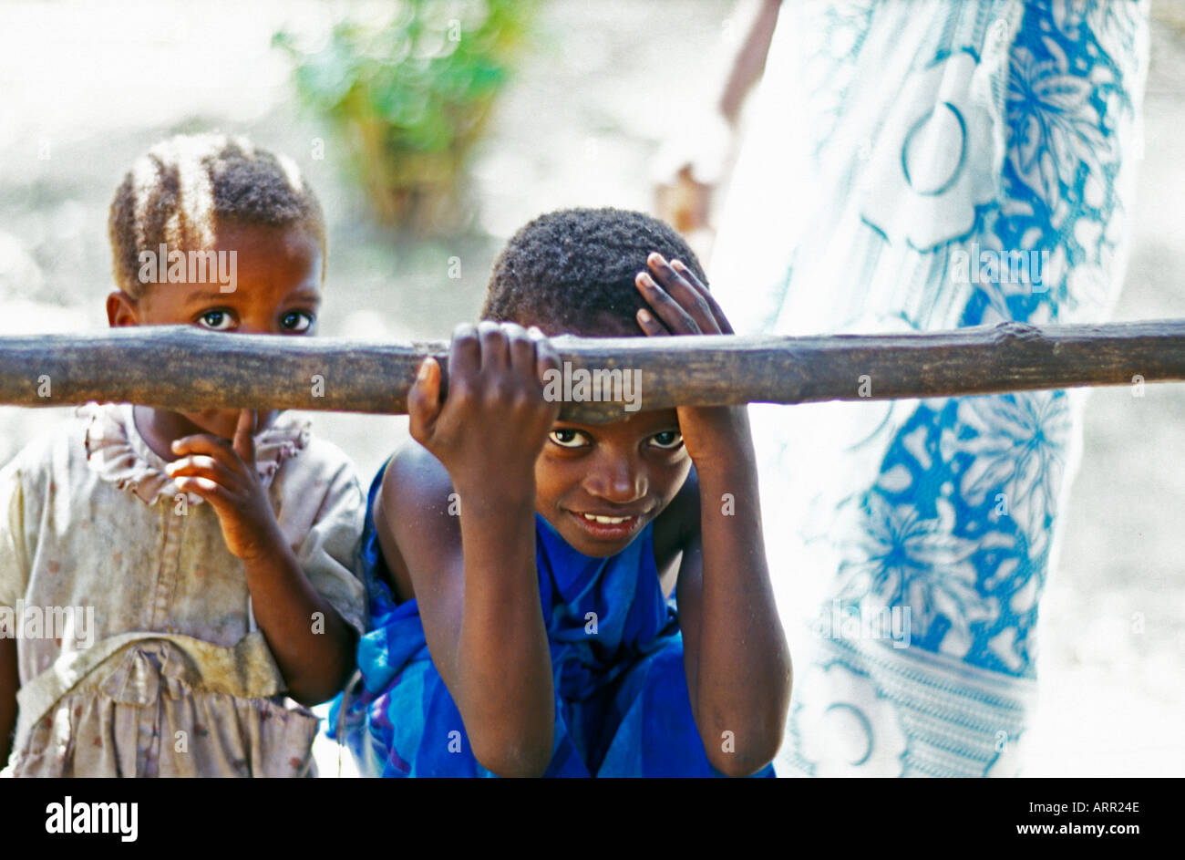 AFRICA KENYA KALIFI Young Kenyan girls play peek a boo with visitors as ...