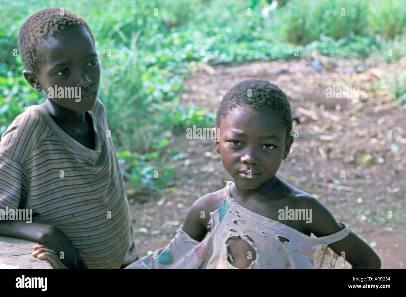AFRICA KENYA KALIFI Young Kenyan boys in very ragged t-shirts in their ...