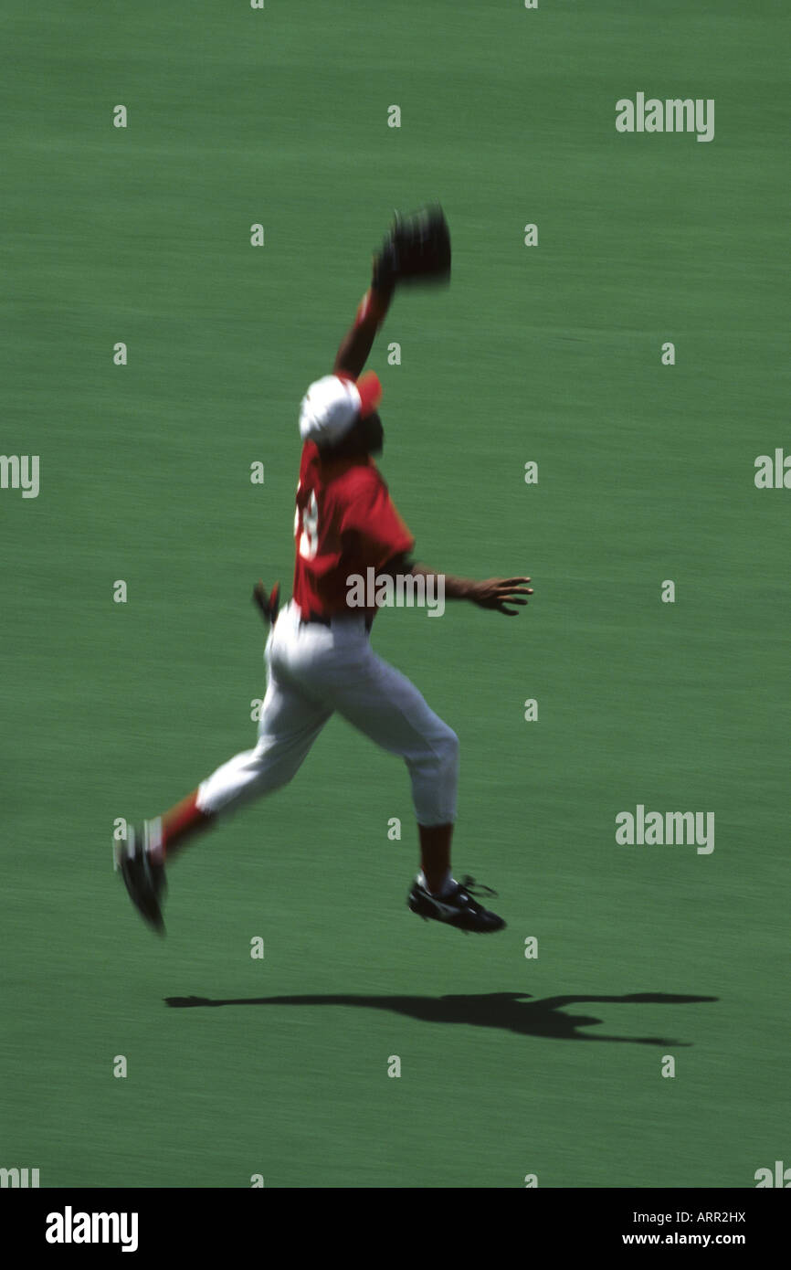 Leaping to catch a ball hi-res stock photography and images - Alamy