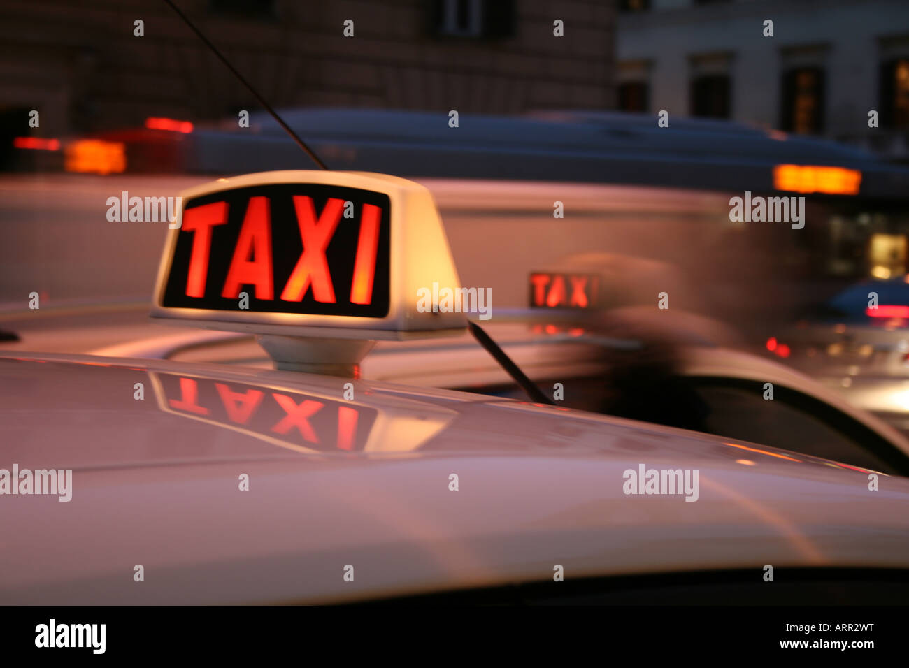 taxis at night Stock Photo - Alamy